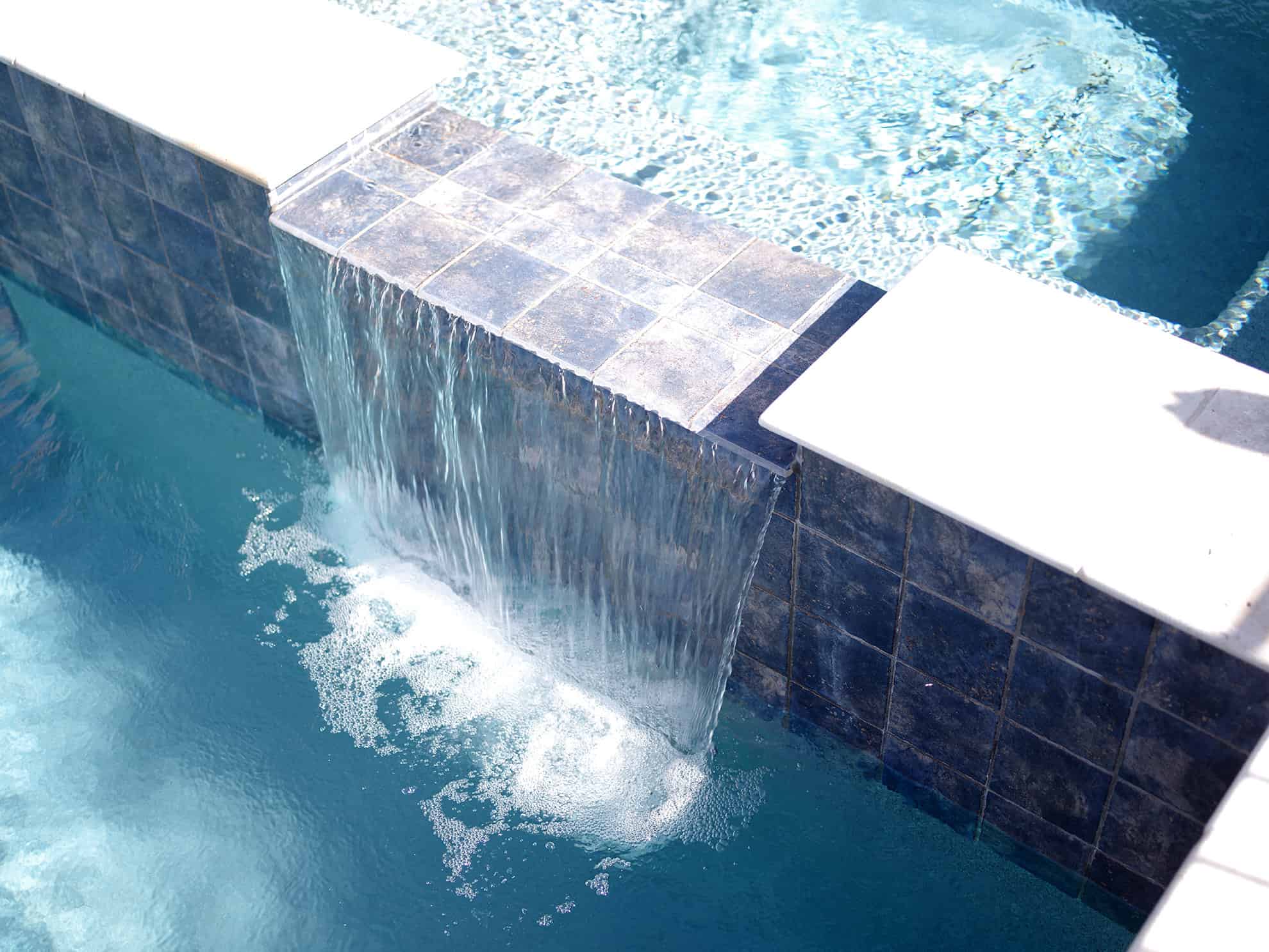 Water Features That Perfectly Pair With A Geometric Pool